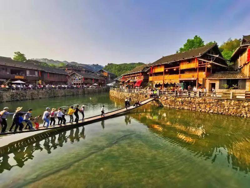 不止螺蛳粉！这里还有充满民族风情的山水画卷…… | 春节在广西怎么玩 _活动_程阳_苗寨